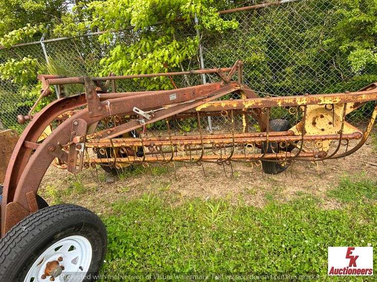 NEW HOLLAND 56 HAY RAKE W/ DOLLY WHEELS - EK Auctioneers LLC