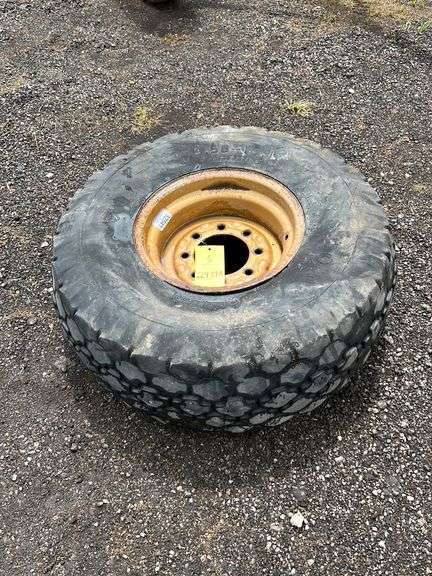 13.50-16.1 8 LUG IMPLEMENT WHEEL & TIRE - EK Auctioneers LLC
