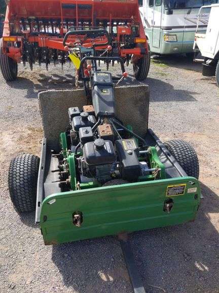 (2) JOHN DEERE GOLF COURSE LAWN MOWERS W/ TRAILER - EK Auctioneers LLC