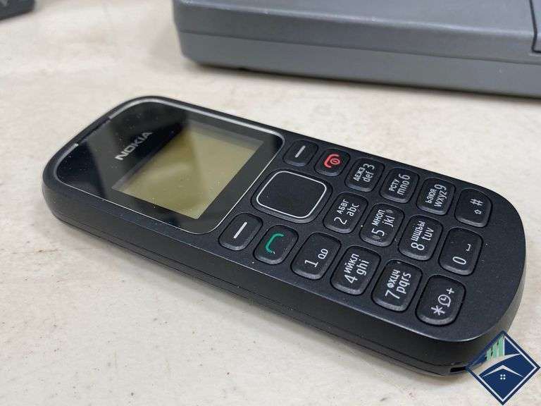 Texas Instrument Laptop & Vintage Cell Phones - Estate Details