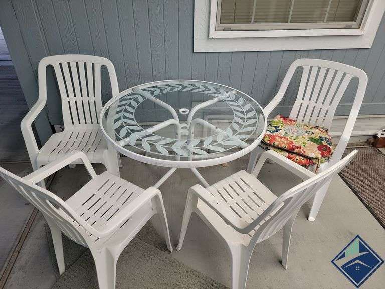 Glass Patio Table With 4 Plastic Chairs - Estate Details