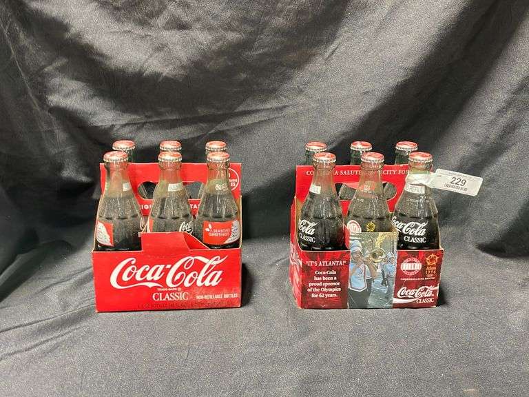Collectible Coca-Cola Bottle Six Packs - Auction Services LTD
