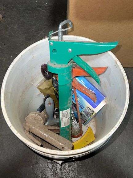 Plastic bucket w/caulking guns - Auction Services LTD