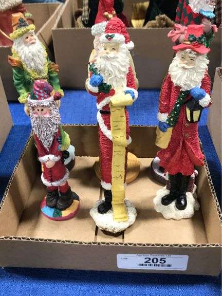 Skinny Santa figurines - Auction Services LTD