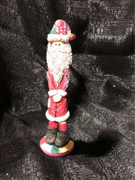 Skinny Santa figurines - Auction Services LTD