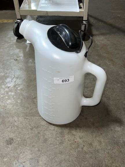 Liquid Dispenser with measure Gauge - Auction Services LTD