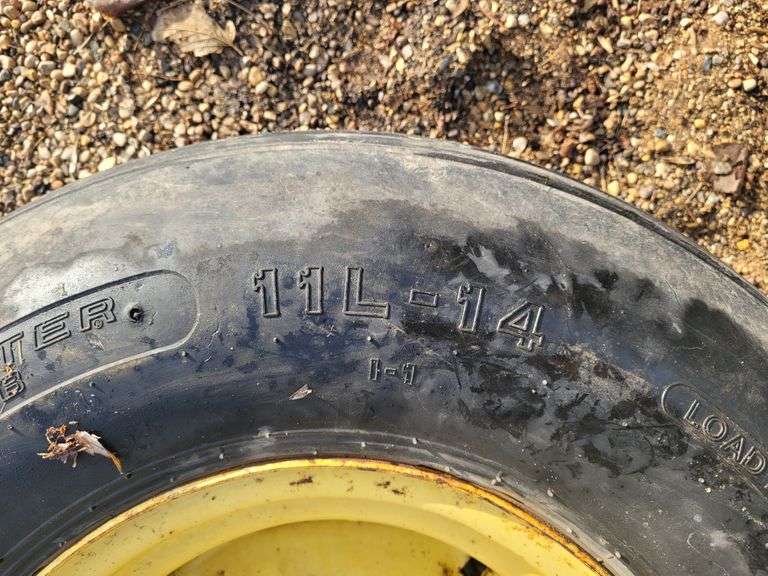 11L x 14 Implement Tire on Rim - Fragodt Auction and Real Estate LLC