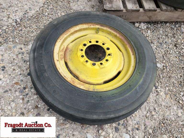 5.50-16SL Tire on 6 Bolt Implement Rim - Fragodt Auction and Real ...