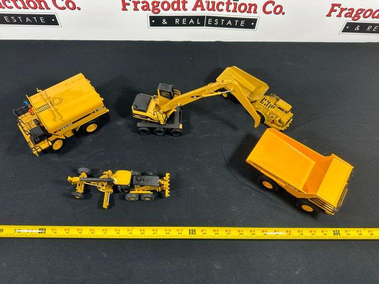 (5) - CAT 777D Water Truck, CAT W345B Wheeled Loader, CAT 14M Road ...