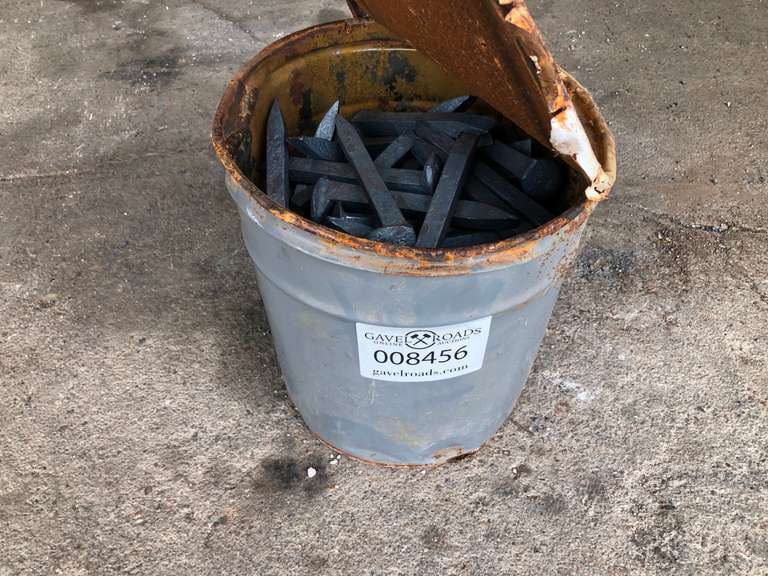 Bucket of Railroad Spikes - Gavel Roads Online Auctions