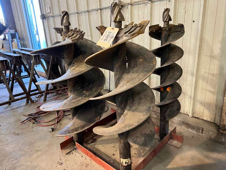 (3) Bobcat Skid Steer Auger Bits & Rack - Gavel Roads Online Auctions