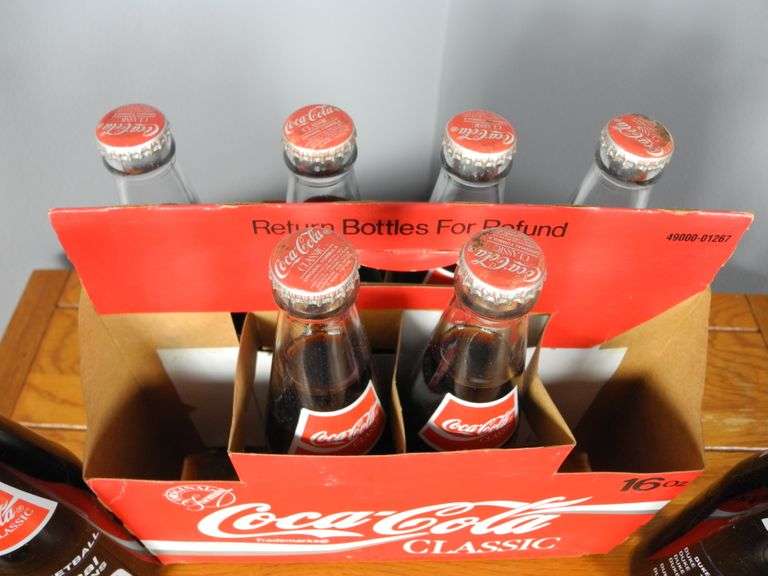 8 Pack of Coca-Cola 1991 DUKE Coke Bottles - GC5 Auctions