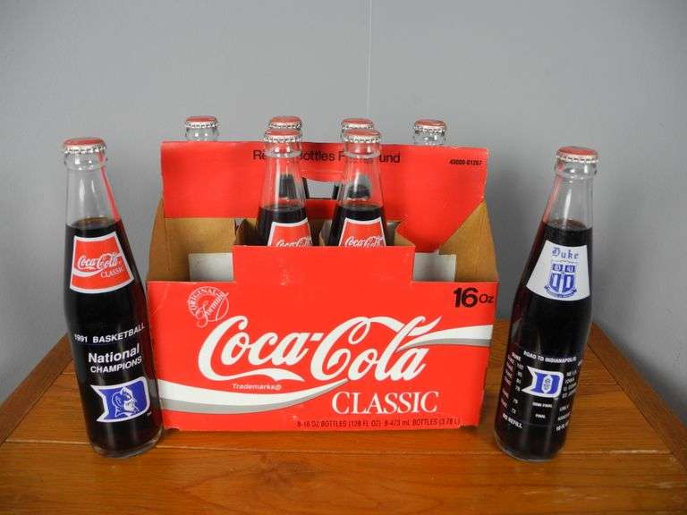 8 Pack of Coca-Cola 1991 DUKE Coke Bottles - GC5 Auctions