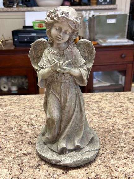 Angel with a bird - Gregg Auctions