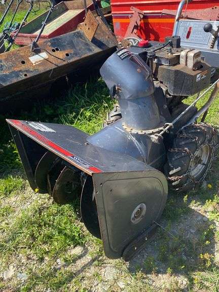 White snowblower - Gregg Auctions