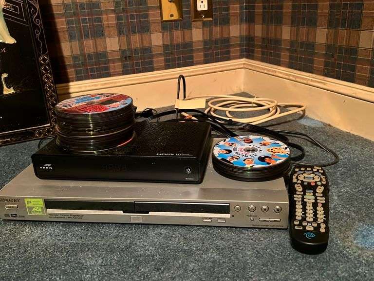 DVD player with DVDs - Gregg Auctions