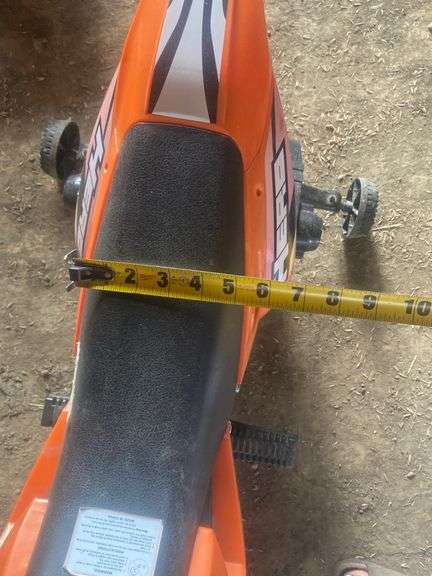 Orange mini bike - Gregg Auctions