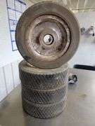 11" vulcanized rubber wheels 1.5" bore - Gregg Auctions