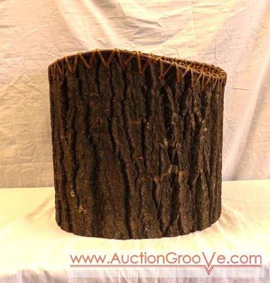This beautiful hand-made basket was made out of the trunk of a tree ...