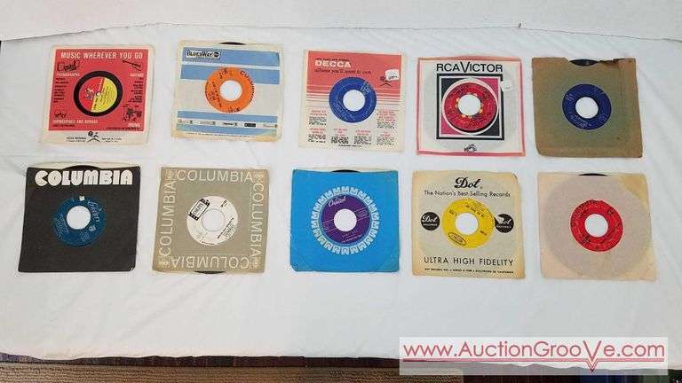 10 45 RPM records believed to be kept in a juke box Records include the ...