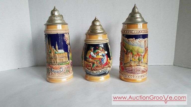 Three steins made in Germany. see photos for manufacturers mark. one ...