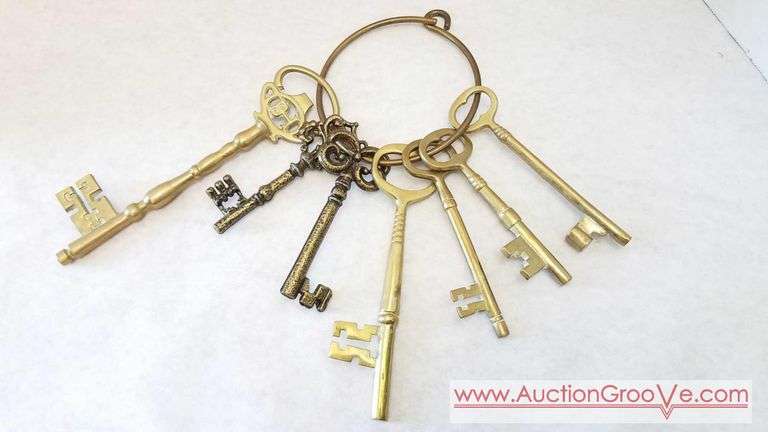Large key ring with decorative Keys. Largest key measures 9 and ...