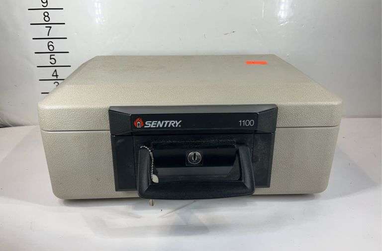 Sentry 1100 safe with key - Hash Auctions