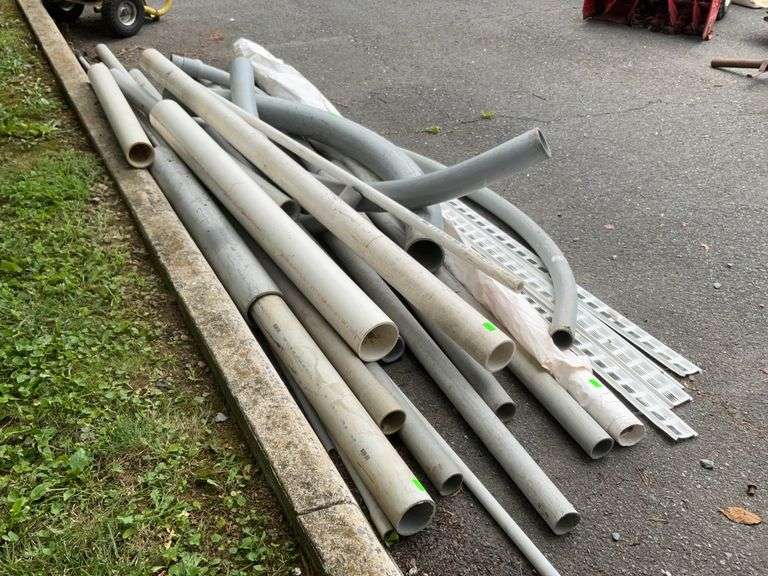 PVC Pipe and conduit Hroup, partial roll of house wrap, and soffit ...