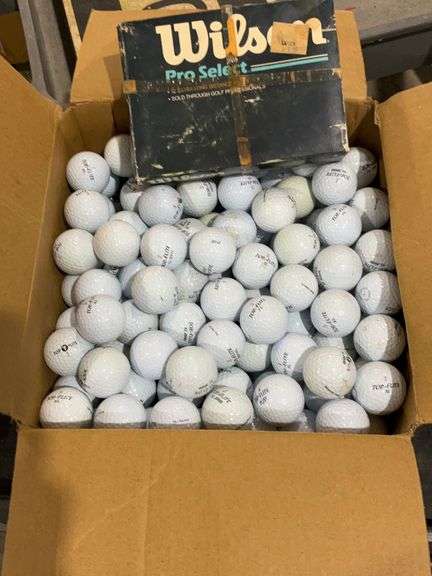 Box of top flite golf balls (several dozen) and one box of new Wilson ...