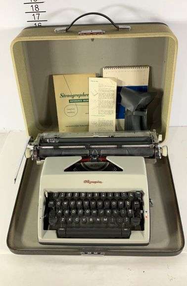 Olympia type writer with travel case - Hash Auctions