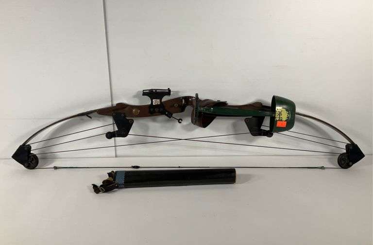 50” Bear Whitetail Hunter compound bow with mounted quiver and leather ...