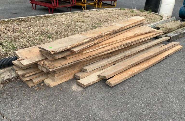 Misc Lumber Boards pile, ruff cut saw mill boards, various widths, and ...