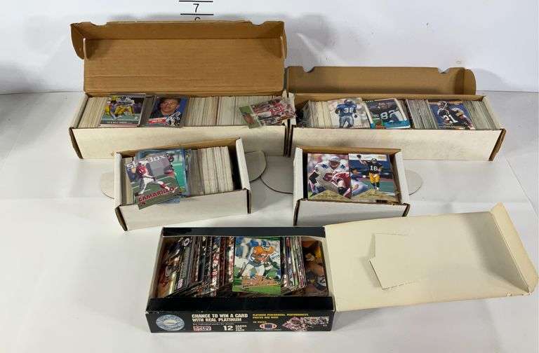 5 boxes of football cards several different years and makes - Hash Auctions