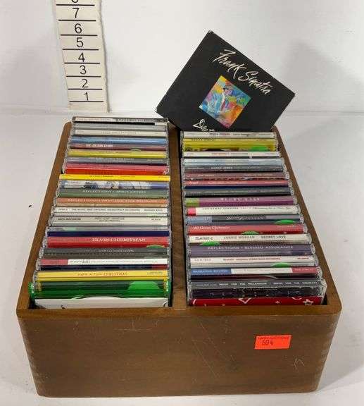 Wooden CD organizer with CDs, includes Frank Sinatra, Norah Jones ...