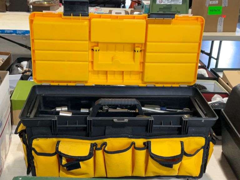 Yellow tool box with sockets, caulk gun, wrenches, canvas tool holder ...
