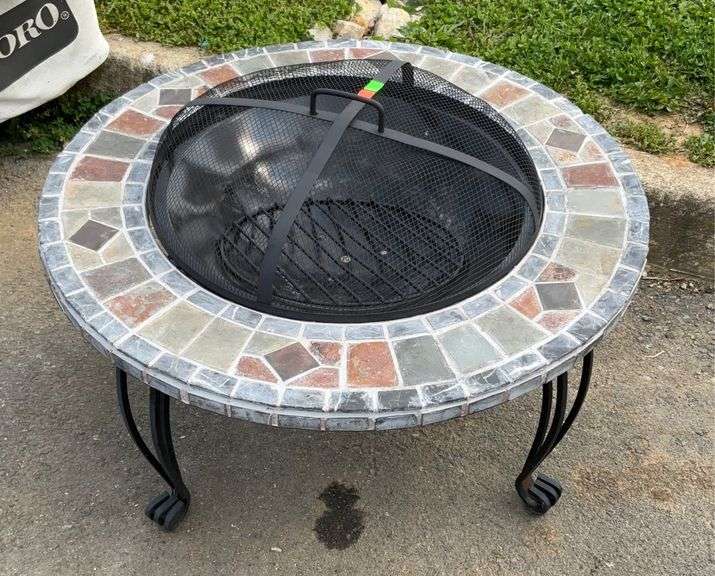 Nice patio Firepit, iron scroll design legs, stone tile ring with dome ...