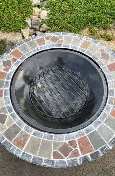 Nice patio Firepit, iron scroll design legs, stone tile ring with dome ...