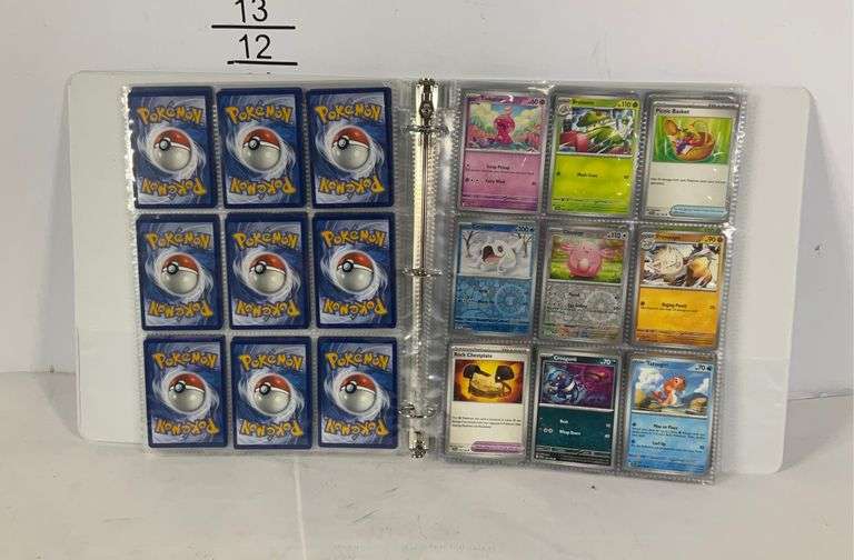 Binder full of Pokémon cards, 108 cards total, 16 holographic cards ...