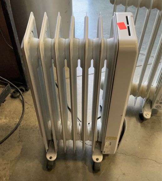 Oil filled electric radiator. Works missing face plate but still ...