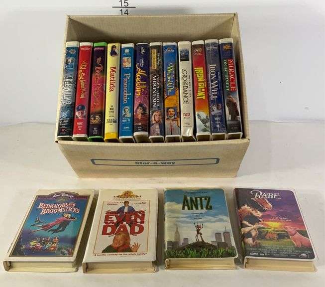 Group of VHS clamshell tapes, two layers in the box, randomly checked ...