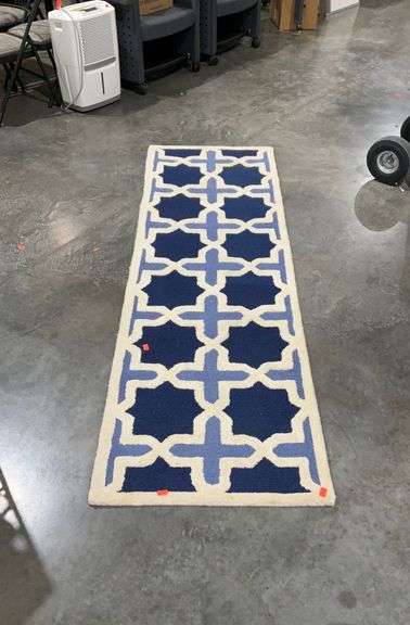 Blue and white runner rug, 30x94”, has stain - Hash Auctions