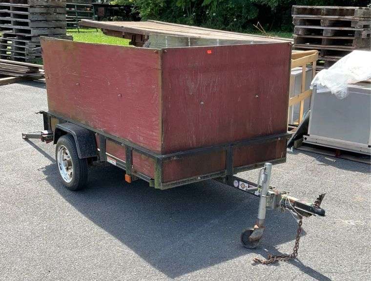 Trailer, wood panel walls, trailer jack with wheel, tires have air, rubber mat on mesh floor ...
