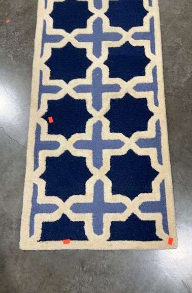 Blue and white runner rug, 30x94”, has stain - Hash Auctions