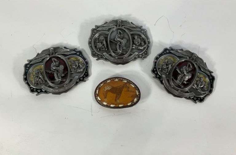 Lot of 4 belt buckles. 3 championship wresting and 1 leather stitched ...