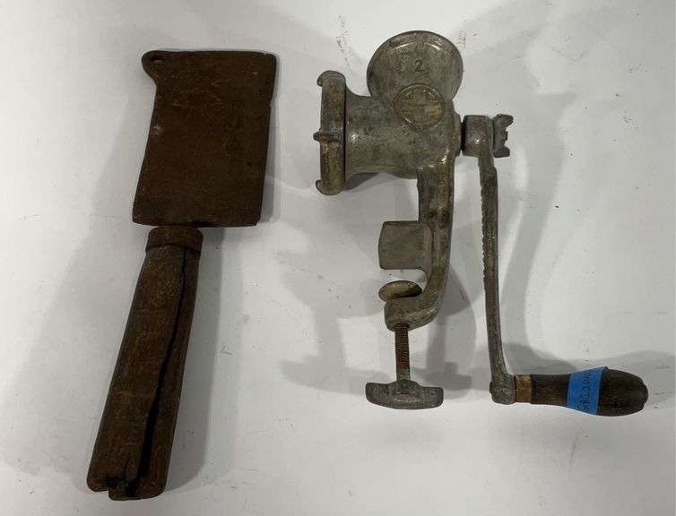 Griswold meat grinder and meat cleaver - Hash Auctions