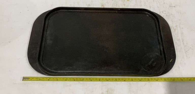 Two sided cast iron tray. - Hash Auctions