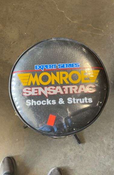 Monroe Shocks advertising store stool man cave - Hash Auctions