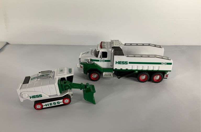 Hess dump truck and loader. - Hash Auctions