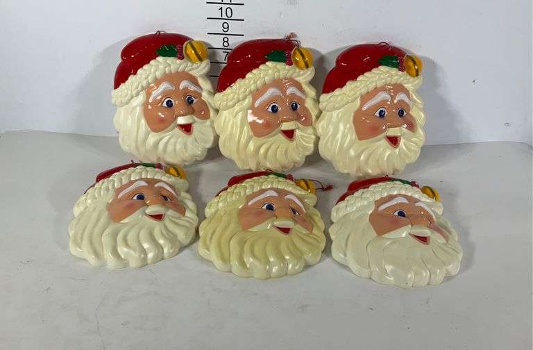 6 hanging battery operated Santa faces. - Hash Auctions