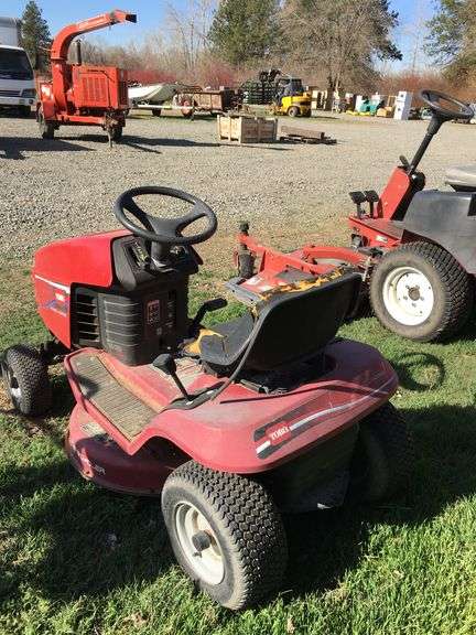 TORO WHEEL HORSE RIDING LAWN MOWER - Heaverlo Northwest Auctions